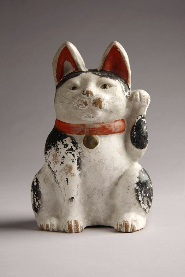 What is the story of maneki-neko, the Japanese beckoning cat? - ABC News