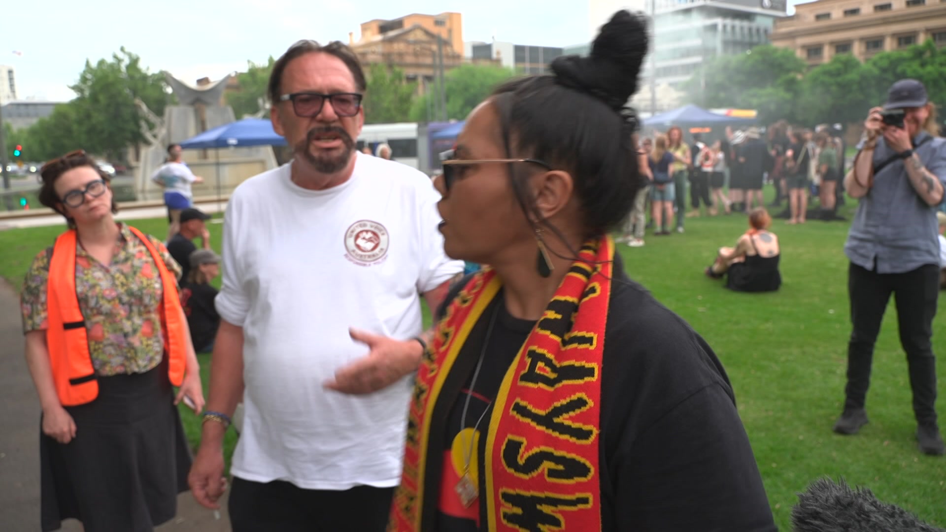 Mark Aldridge interrupted by anti-racism rally organiser - ABC News