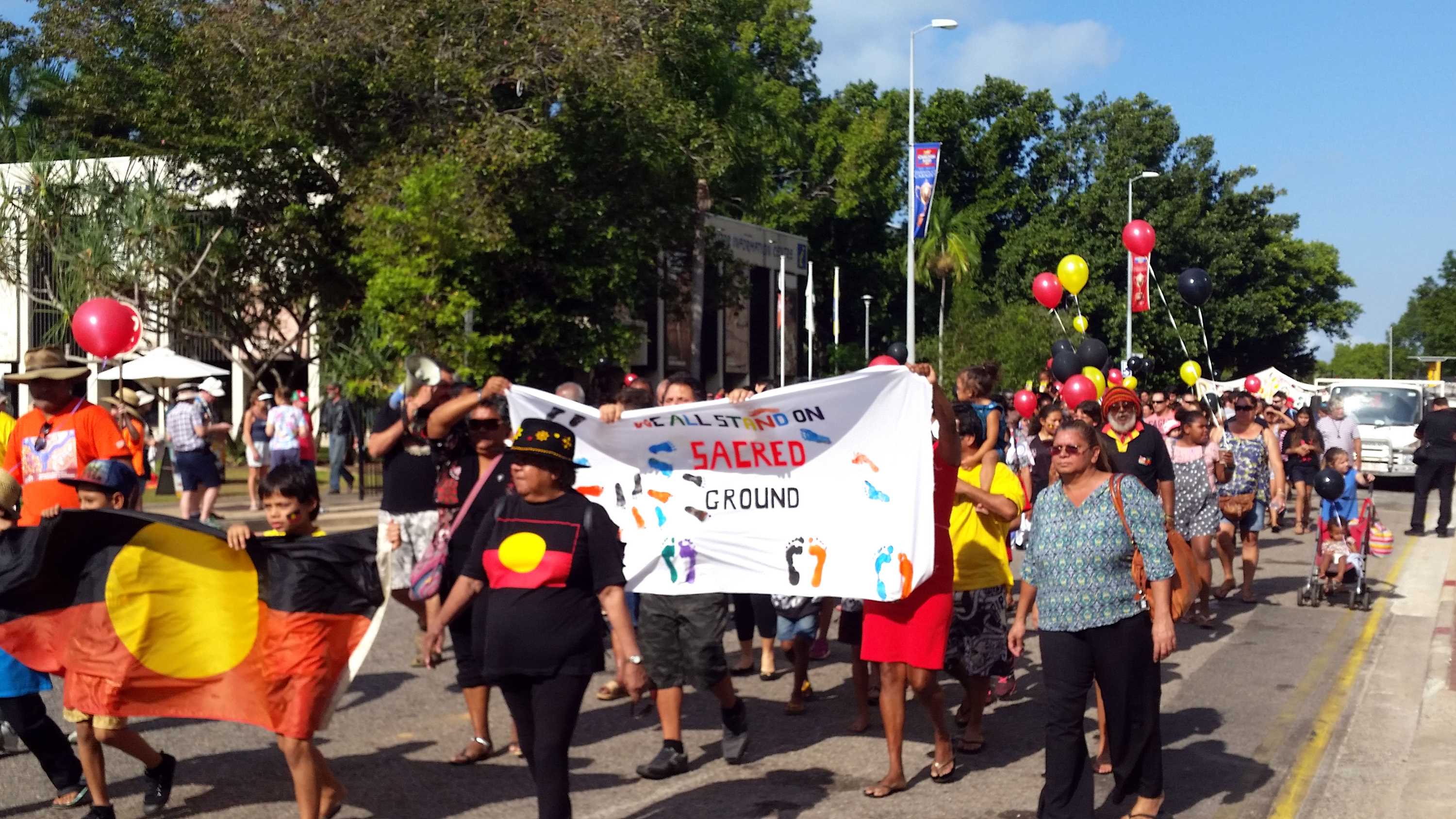 Hundreds of people turn out for NAIDOC Week march in Darwin and Alice ...
