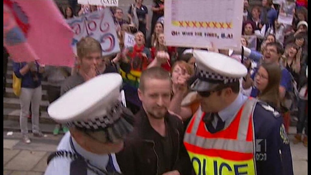Homophobia rally turns violent - ABC News