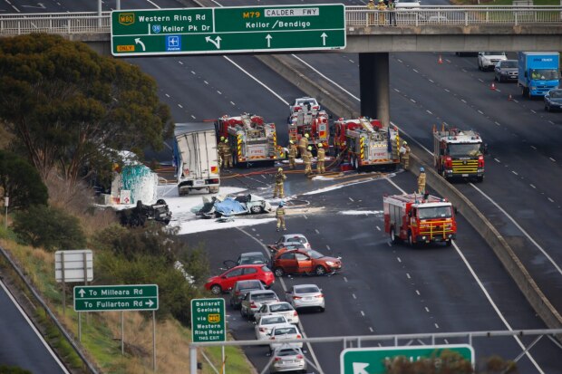 Calder Freeway crash: One dead after petrol tanker rolls, fuel spilt ...