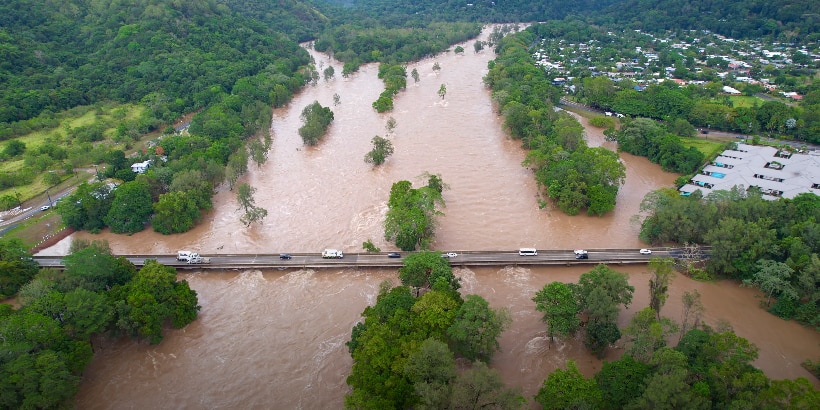Floodwaters in Cairns seen from above. - ABC News