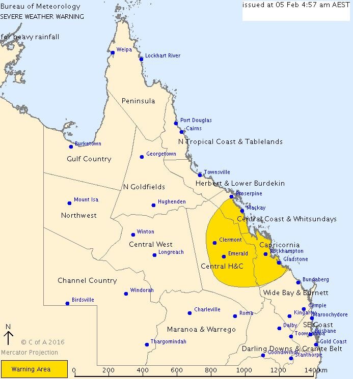 Driver rescued from floodwaters, Callide Dam opens gates as Central ...