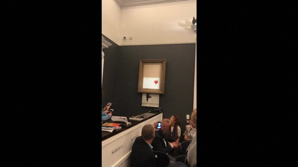 'Girl With Balloon' destroyed at auction - ABC News