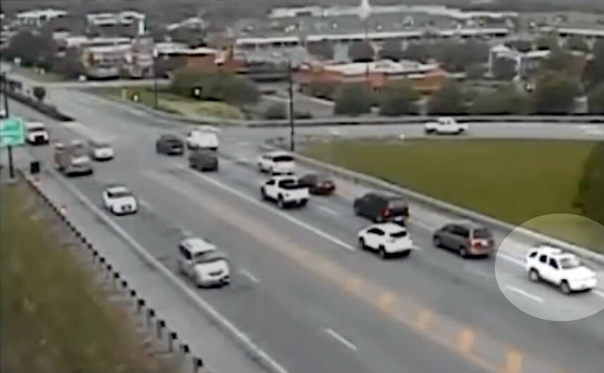 Traffic camera footage shows car driving backwards on busy Ohio highway ...