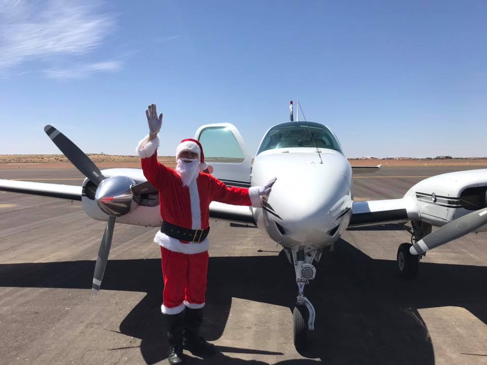 Santa swaps his sleigh for a plane to get a head start on outback ...
