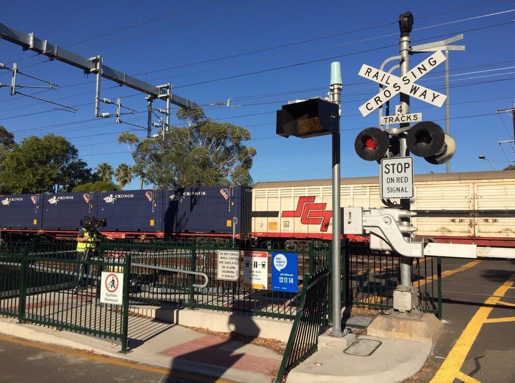 Crossings reopen after two Adelaide freight trains collide during peak ...
