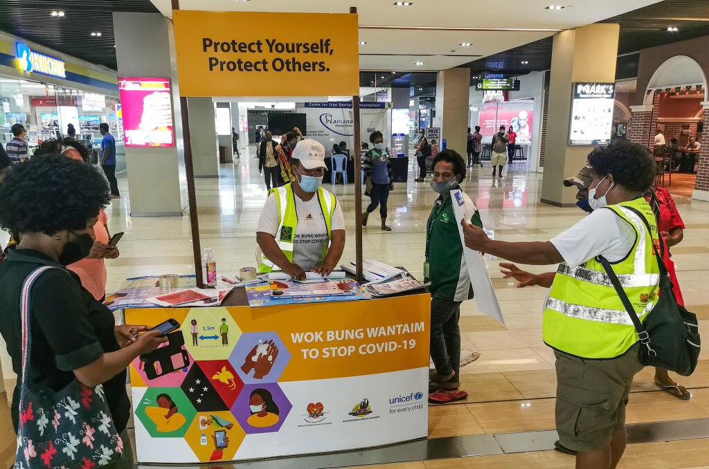 COVID takes hold in PNG - ABC Radio National