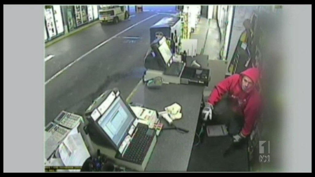 Robber captured on security footage - ABC News