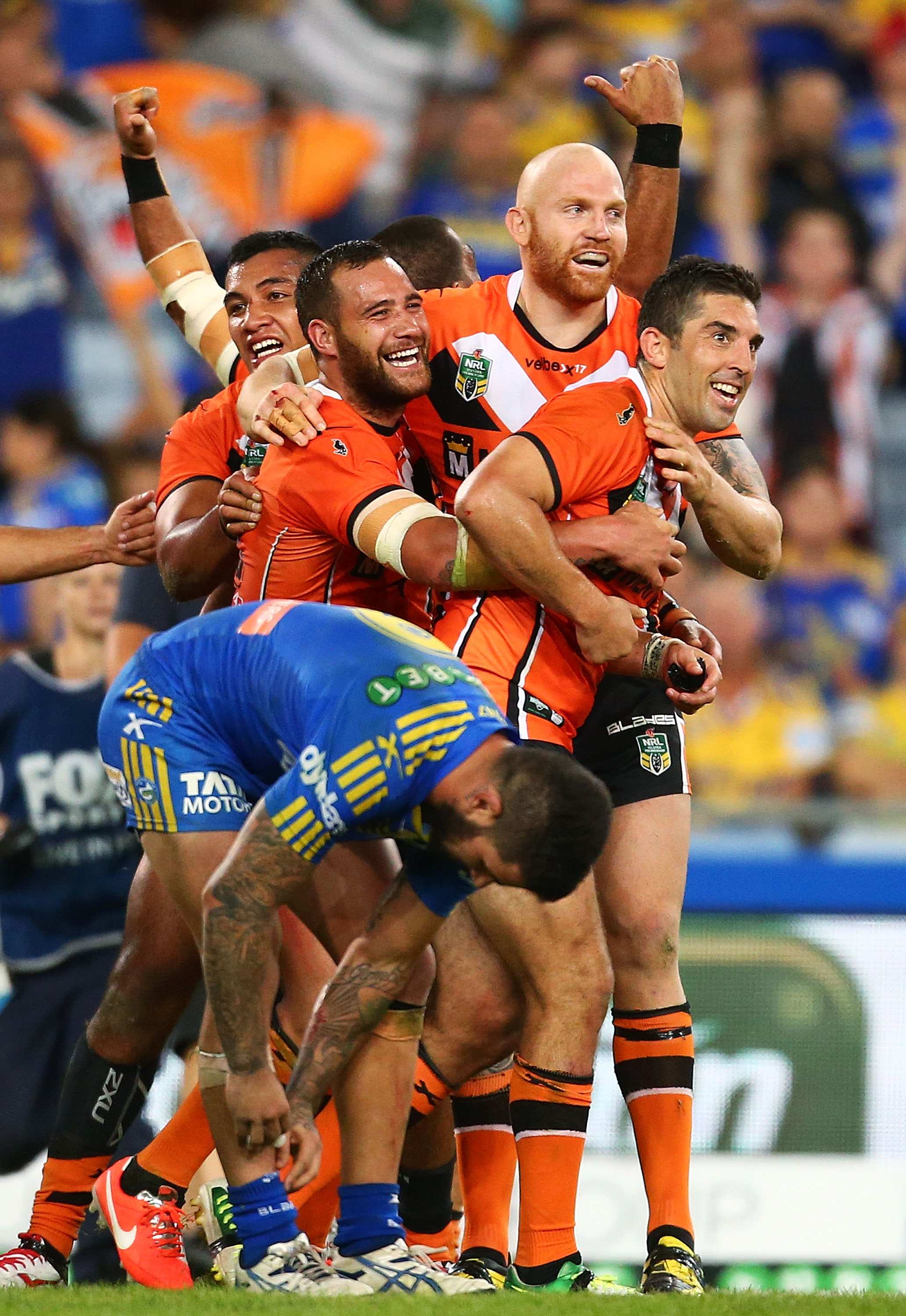 Wests Tigers get 21-18 NRL win over Parramatta Eels in front of bumper ...