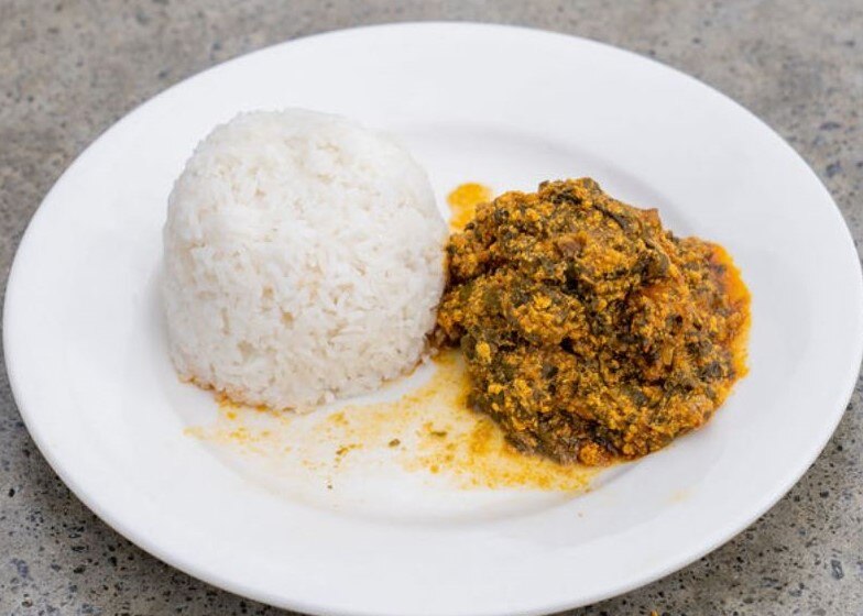 Ghana food stall's agushi sauce with rice - ABC Hobart