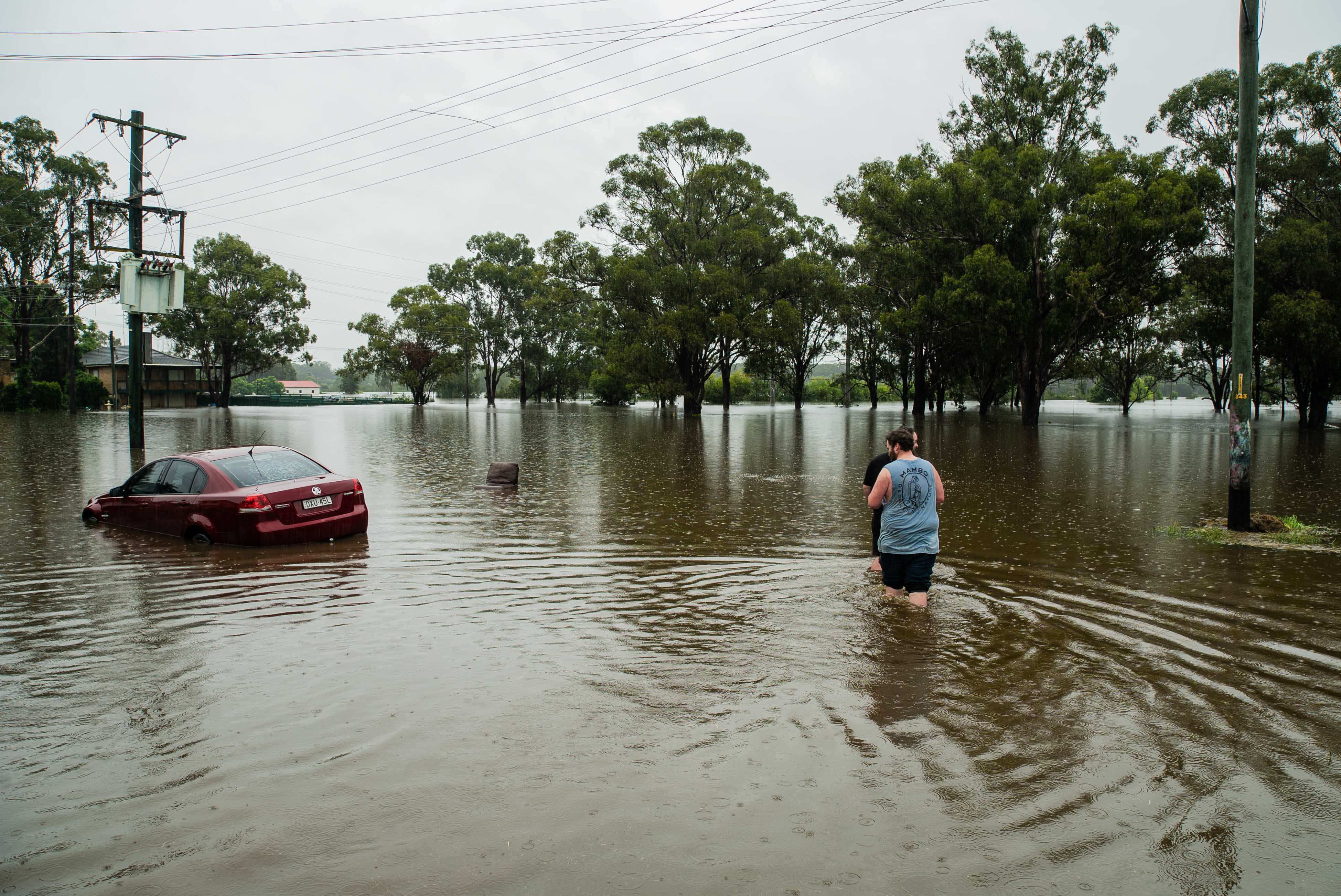 As flooding threatens Sydney's west, here's why some people are not ...