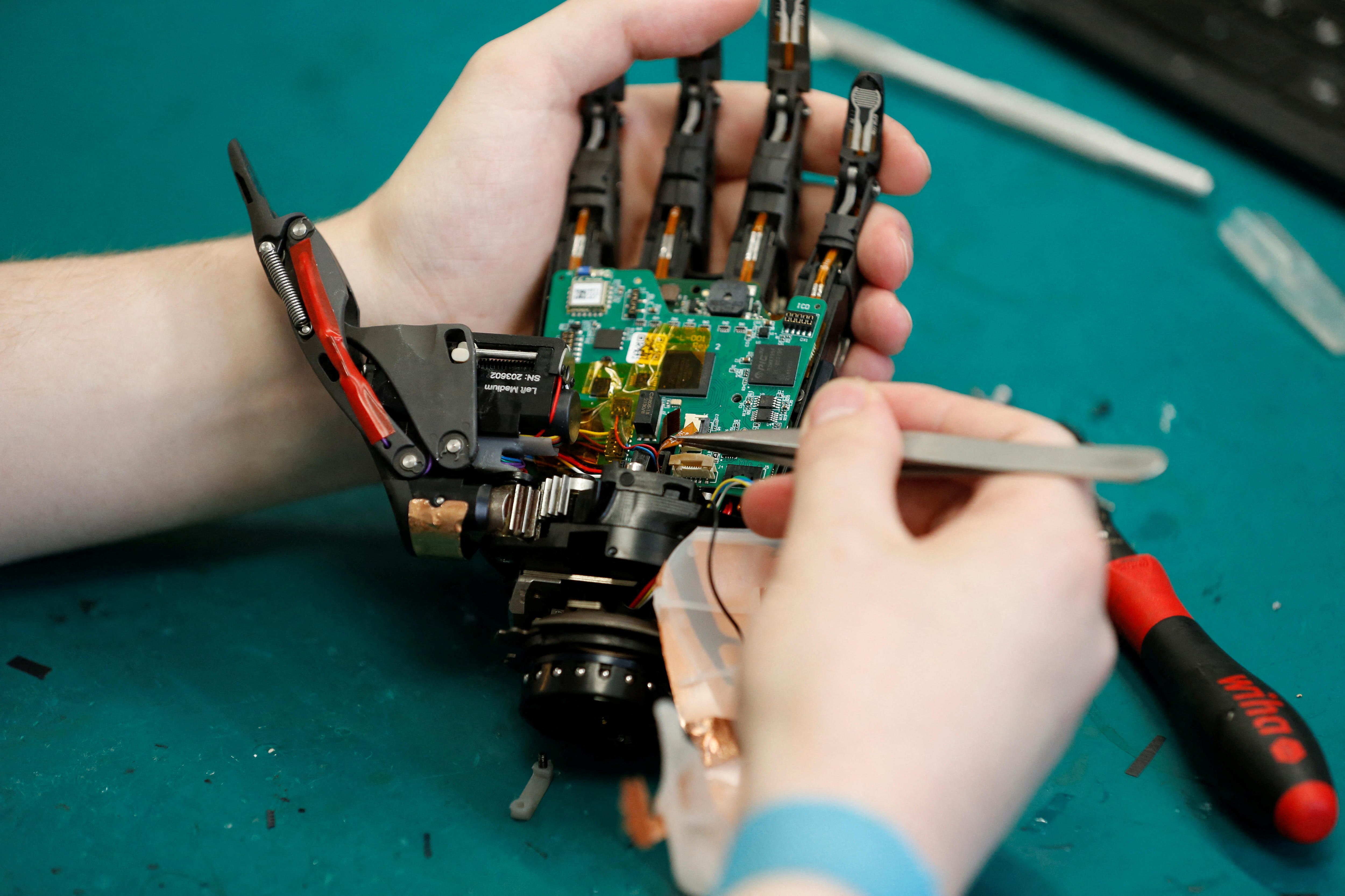 Customisable, updateable bionic hand helps Paralympian overcome uneasy relationship with ...