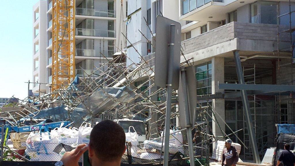 Workcover investigates Sydney scaffolding collapse after two injured at ...