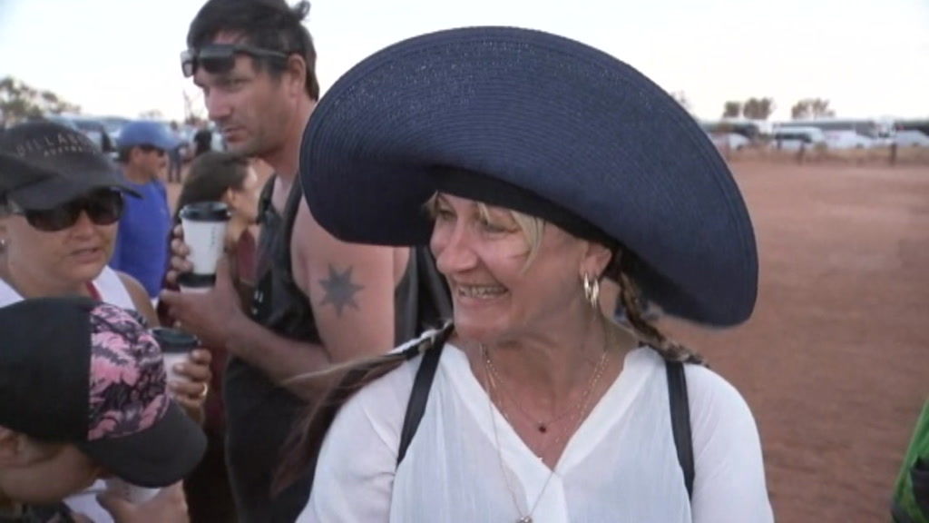 Climbers wait to ascend Uluru as traditional owners aim to educate ...