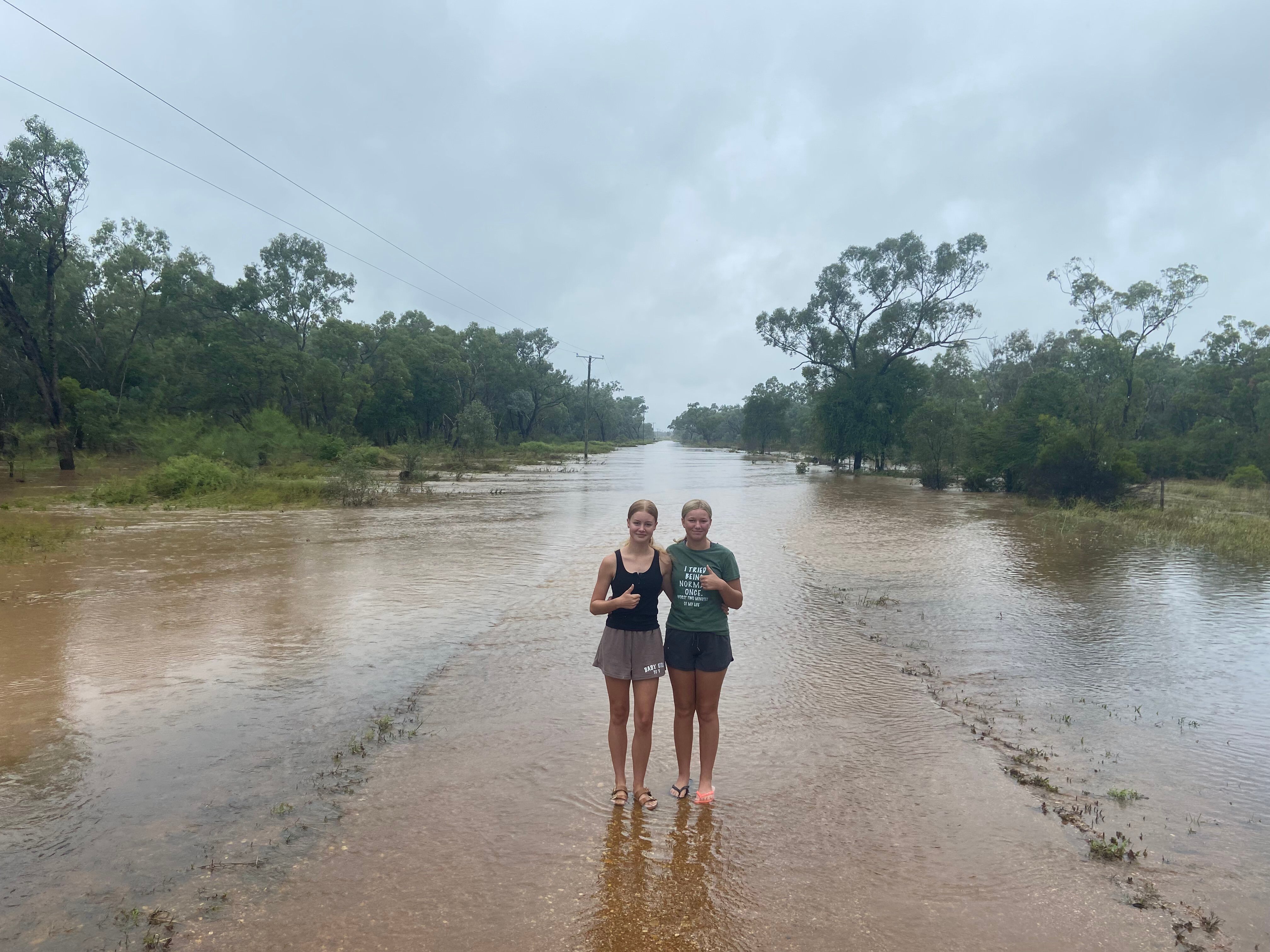 Three women rescued from flood waters, with severe weather 'yet to peak ...