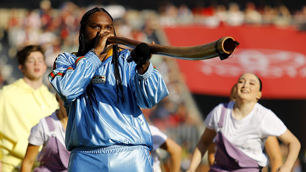 Watch Baker Boy, Birds of Tokyo cover Aussie classics at AFL Grand ...