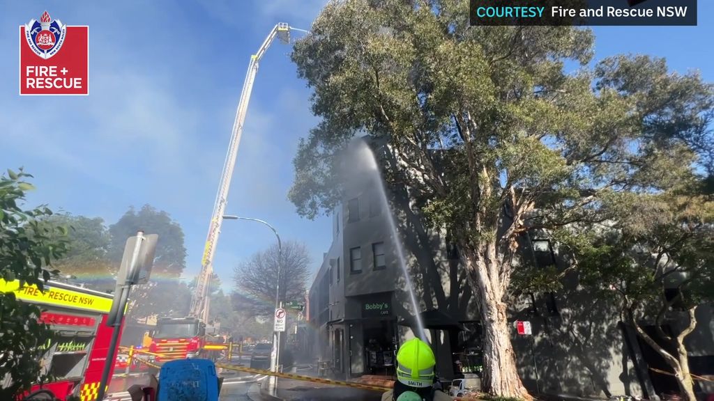 Firefighters withdraw from Sydney unit block after roof collapses - ABC ...