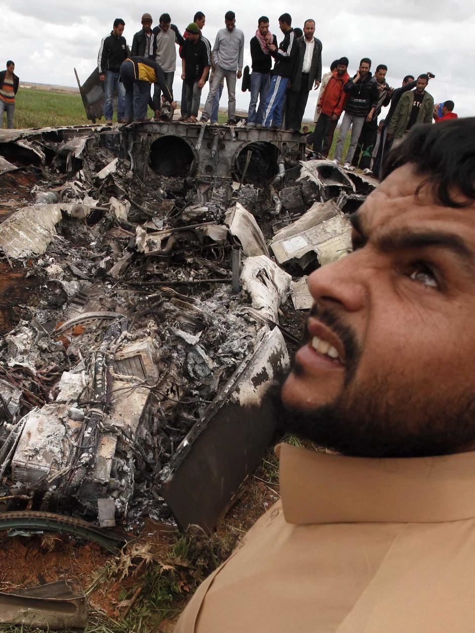 Crew rescued after warplane goes down - ABC News