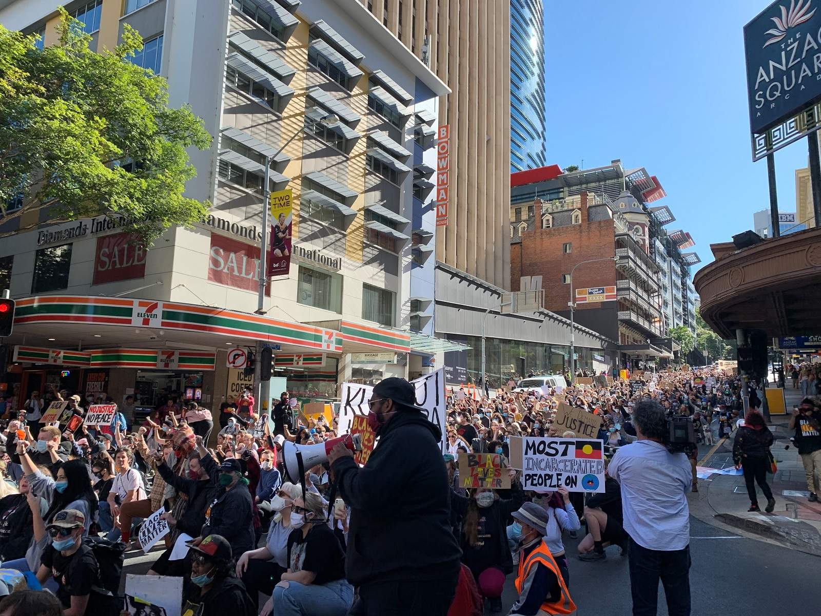 Thousands of protesters march through Brisbane CBD to voice anger over ...