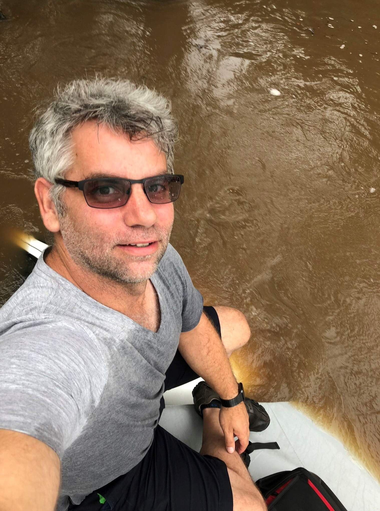 Dashcam captures terrifying moment car crashes into floodwaters, floats ...