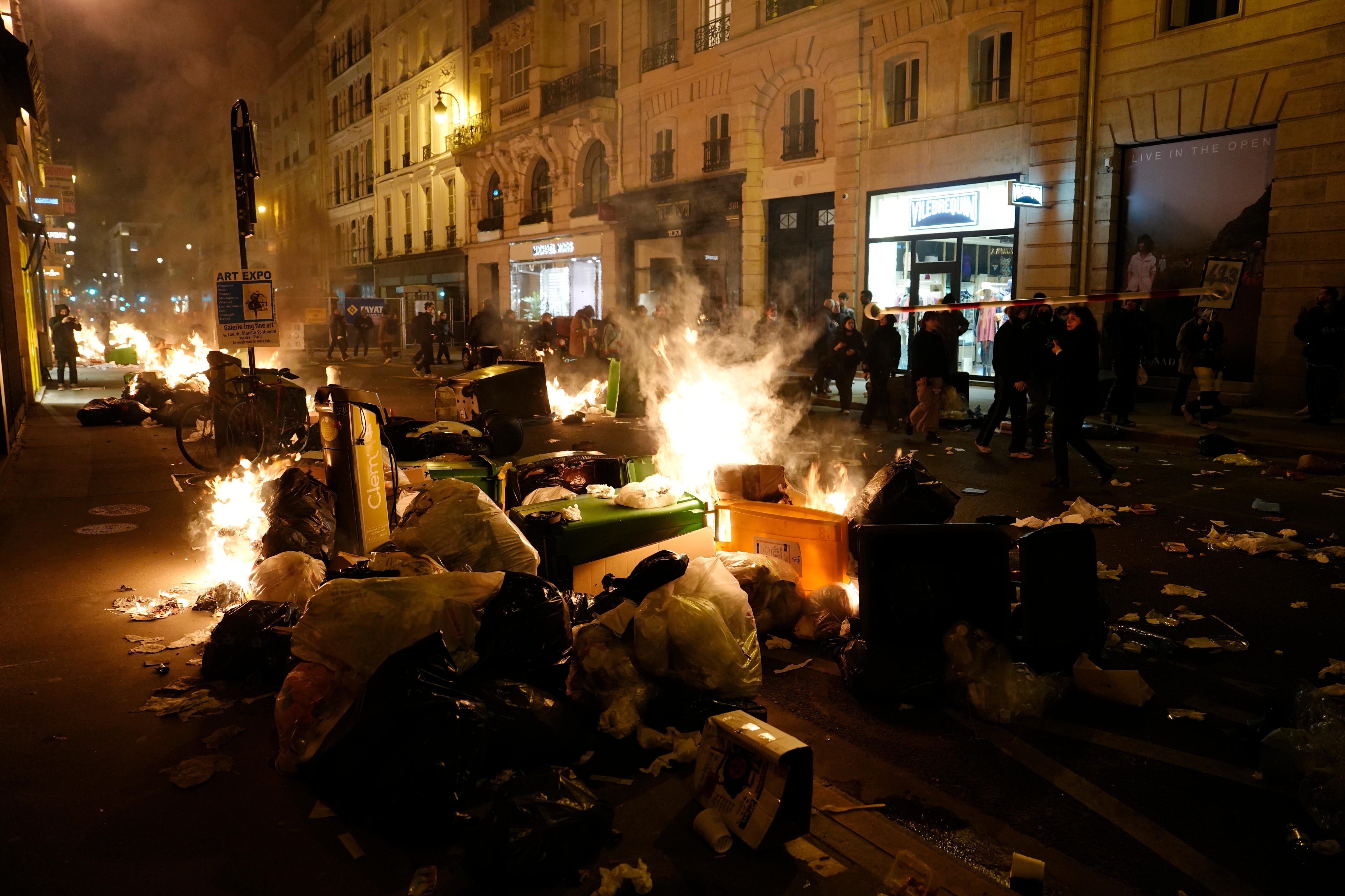Paris garbage collectors protest against President Emmanuel Macron's ...