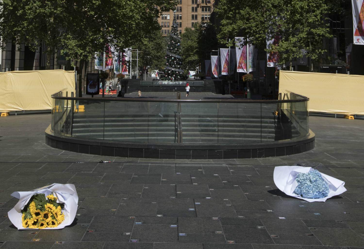 Sydney siege memorial unveiled in Martin Place, three years after ...