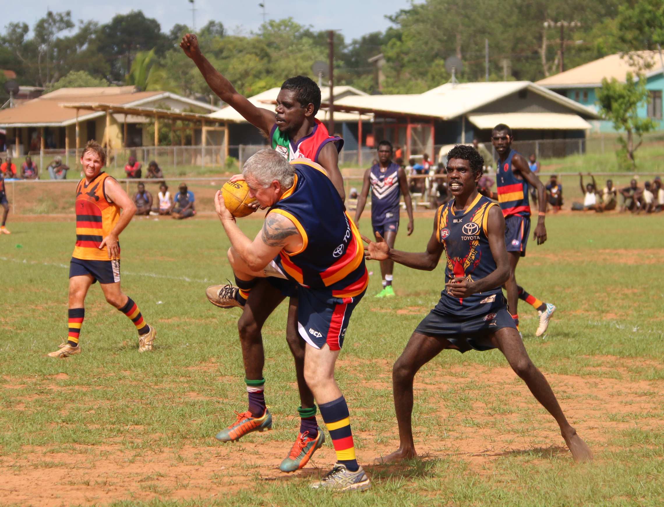 Local police officer kicking goals in effort to keep the peace at ...
