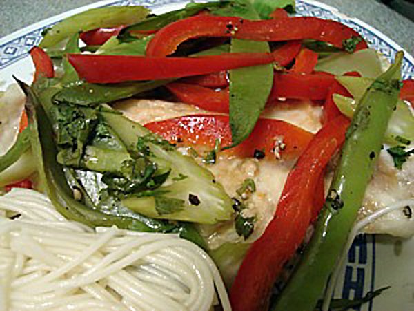 Steamed fish and veggie parcels - ABC News