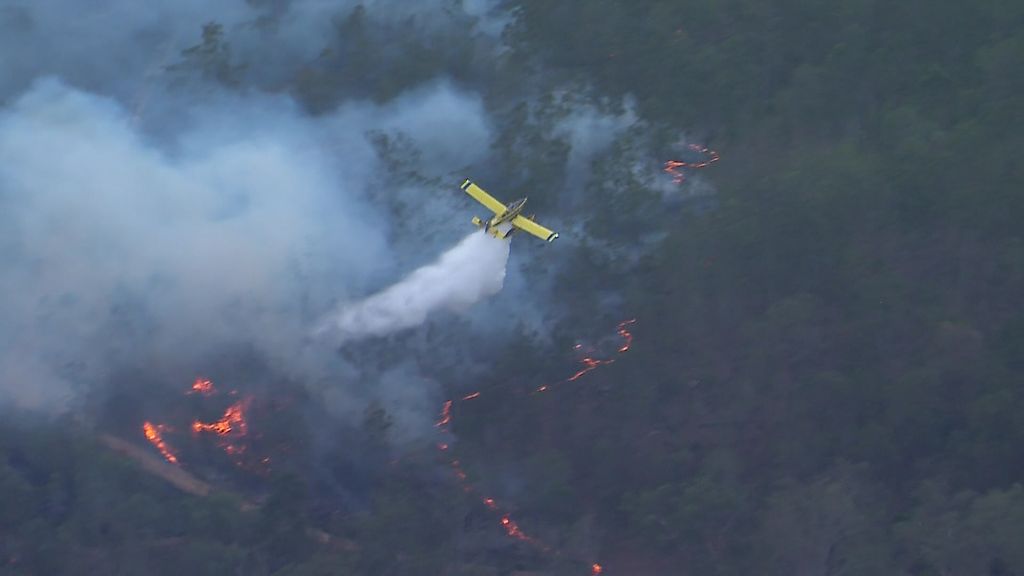 Aircraft helping to battle the blaze in Undullah. - ABC News