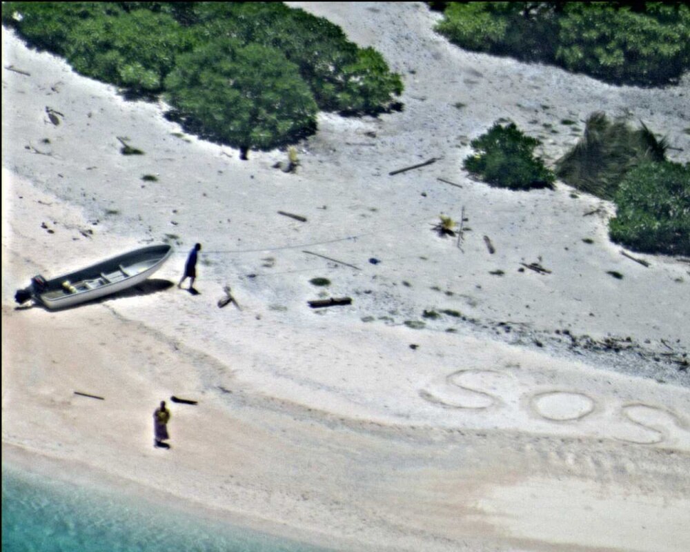'SOS' in sand helps save stranded couple on uninhabited Micronesian ...