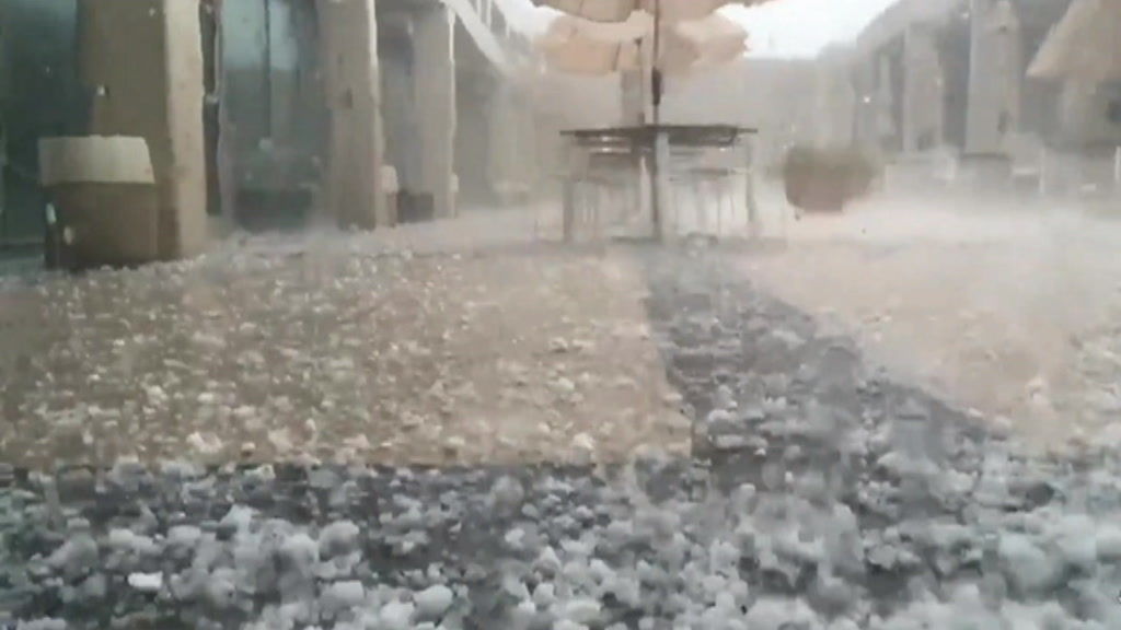 Massive storm blankets Canberra in hail - ABC News