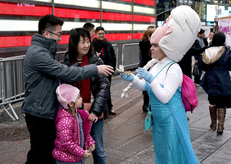 New York cracks down on Time Square's costumed characters, painted ...