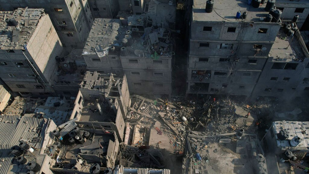 Drone shots show Gaza City neighbourhoods razed by Israeli air strikes ...