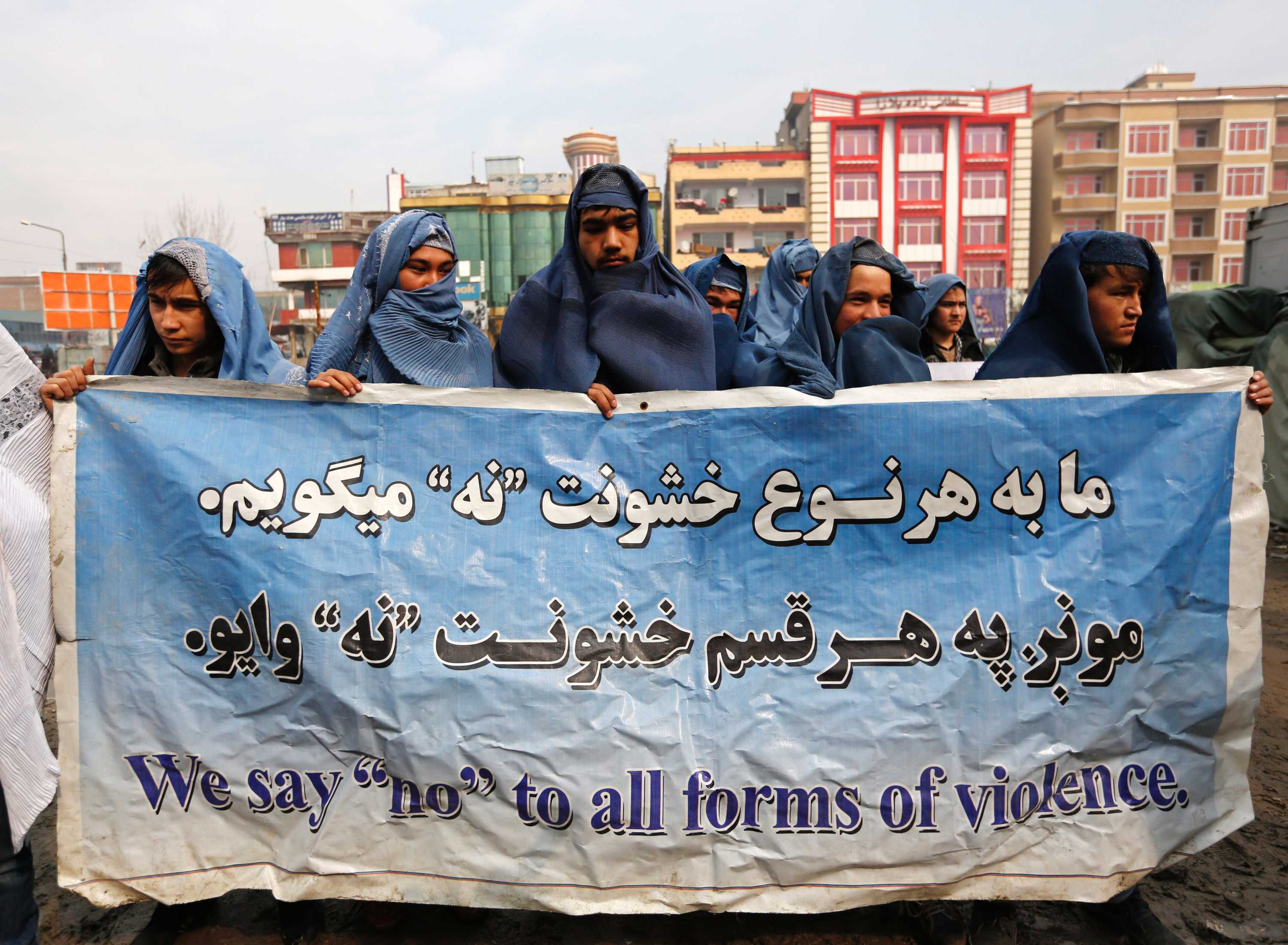 Afghan men march through Kabul streets wearing burkas to highlight ...