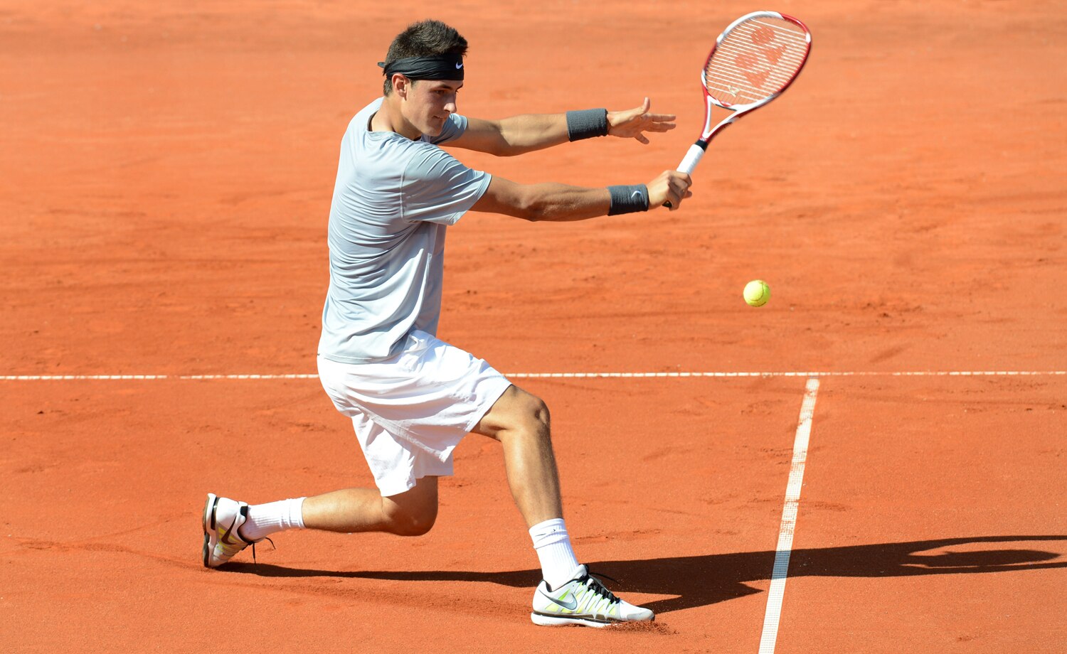 Tomic through to face Djokovic in Rome - ABC News