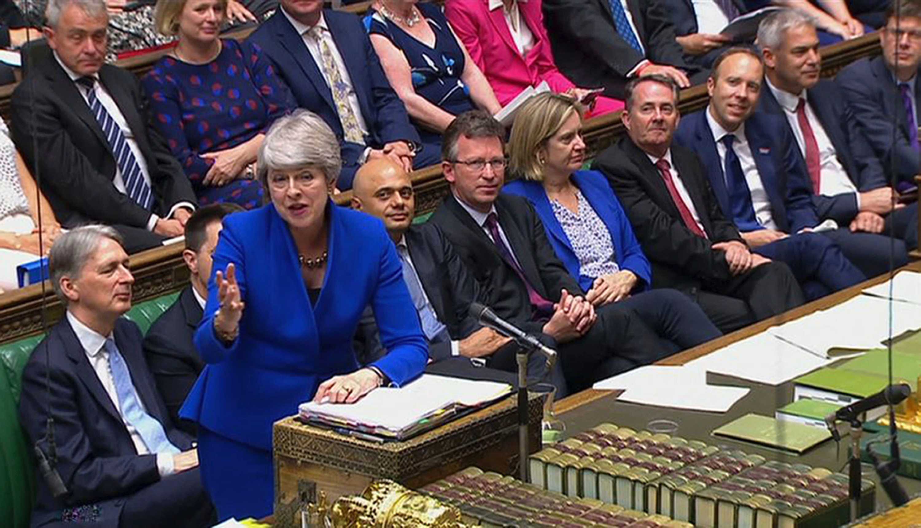 Theresa May heckled to 'stop Brexit' in final speech as Prime Minister ...