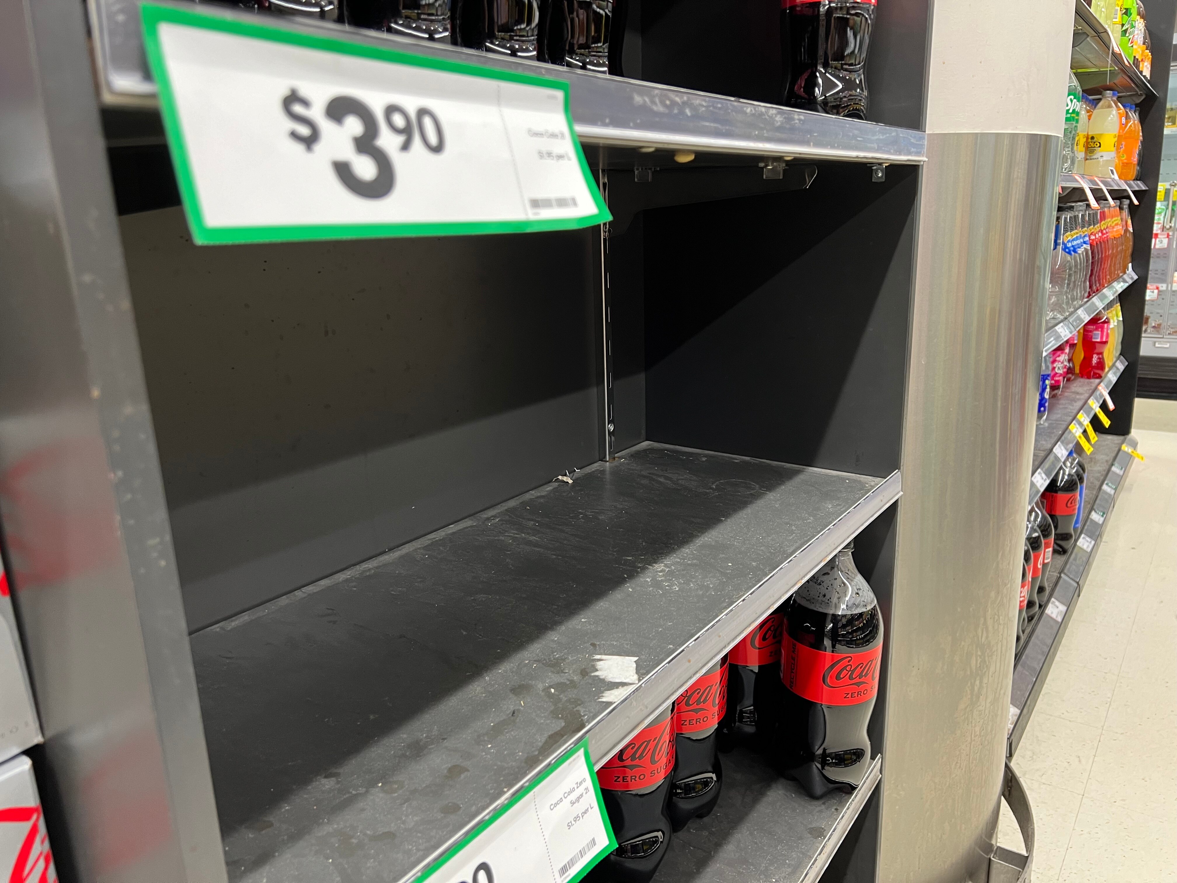 Supermarket shelves depleted of soda water and soft drink amid low ...
