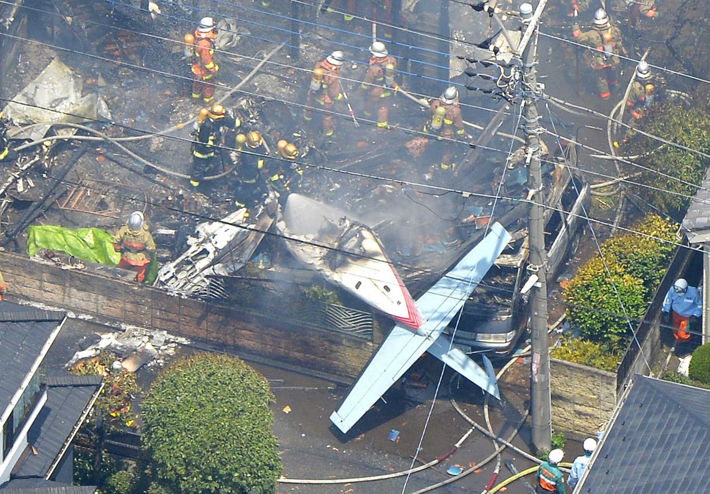 Light plane crashes into Tokyo residential area; three people ...