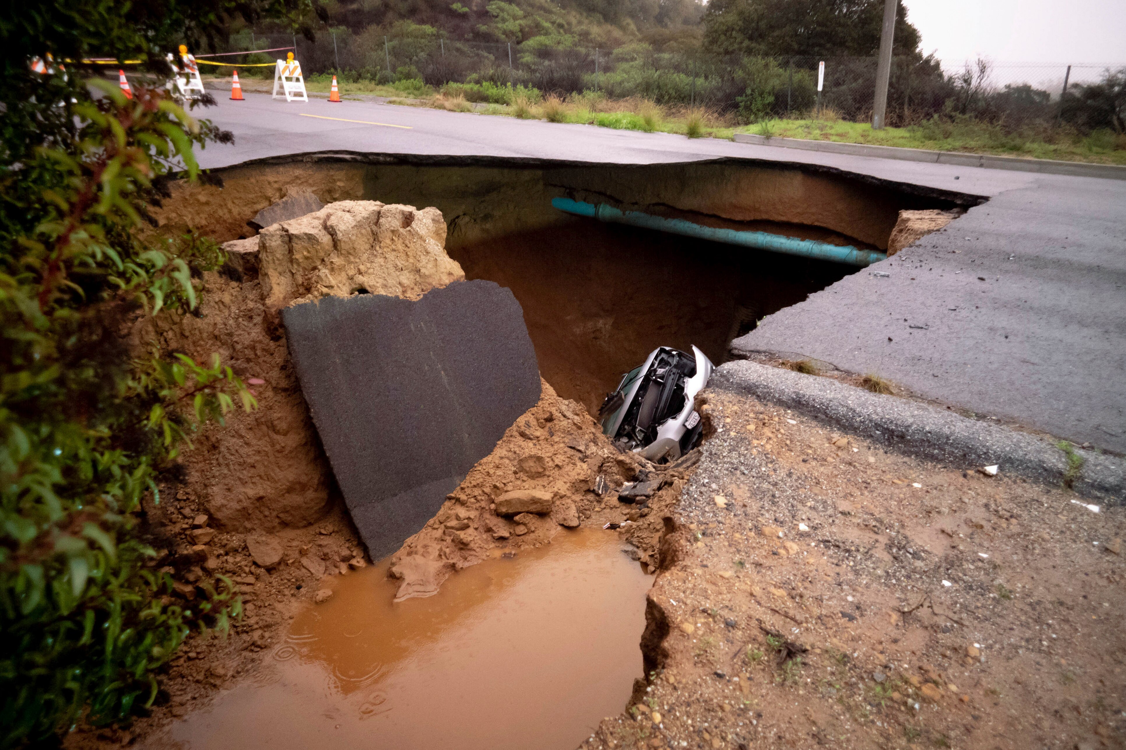California struck by massive floods causing sinkholes and widespread ...