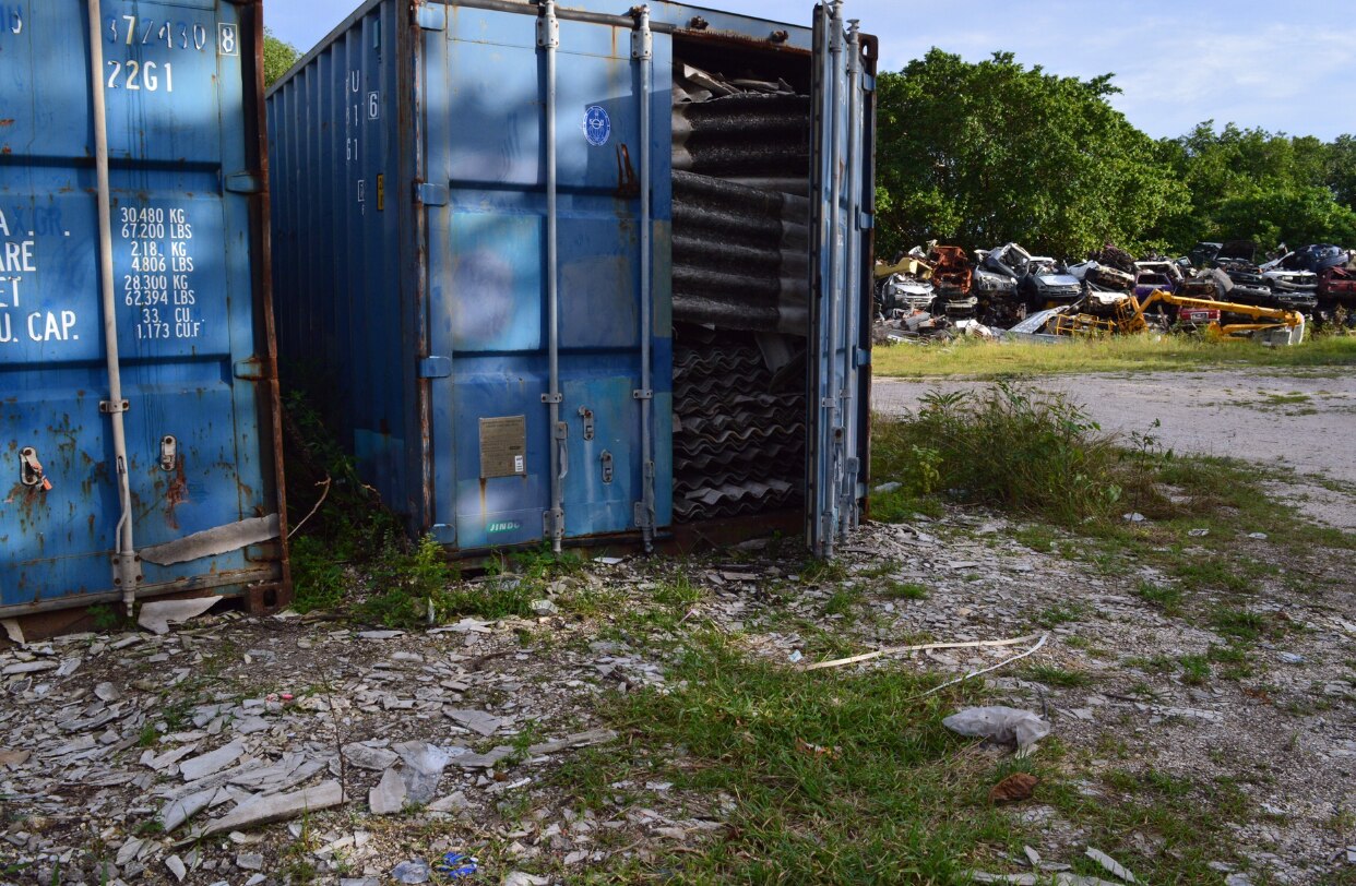 Nauru refugees exposed to asbestos after shipping containers dumped ...