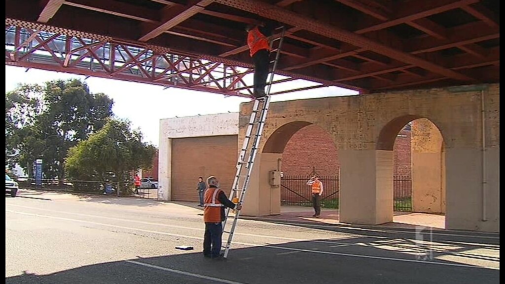 Truck hits rail bridge - ABC News