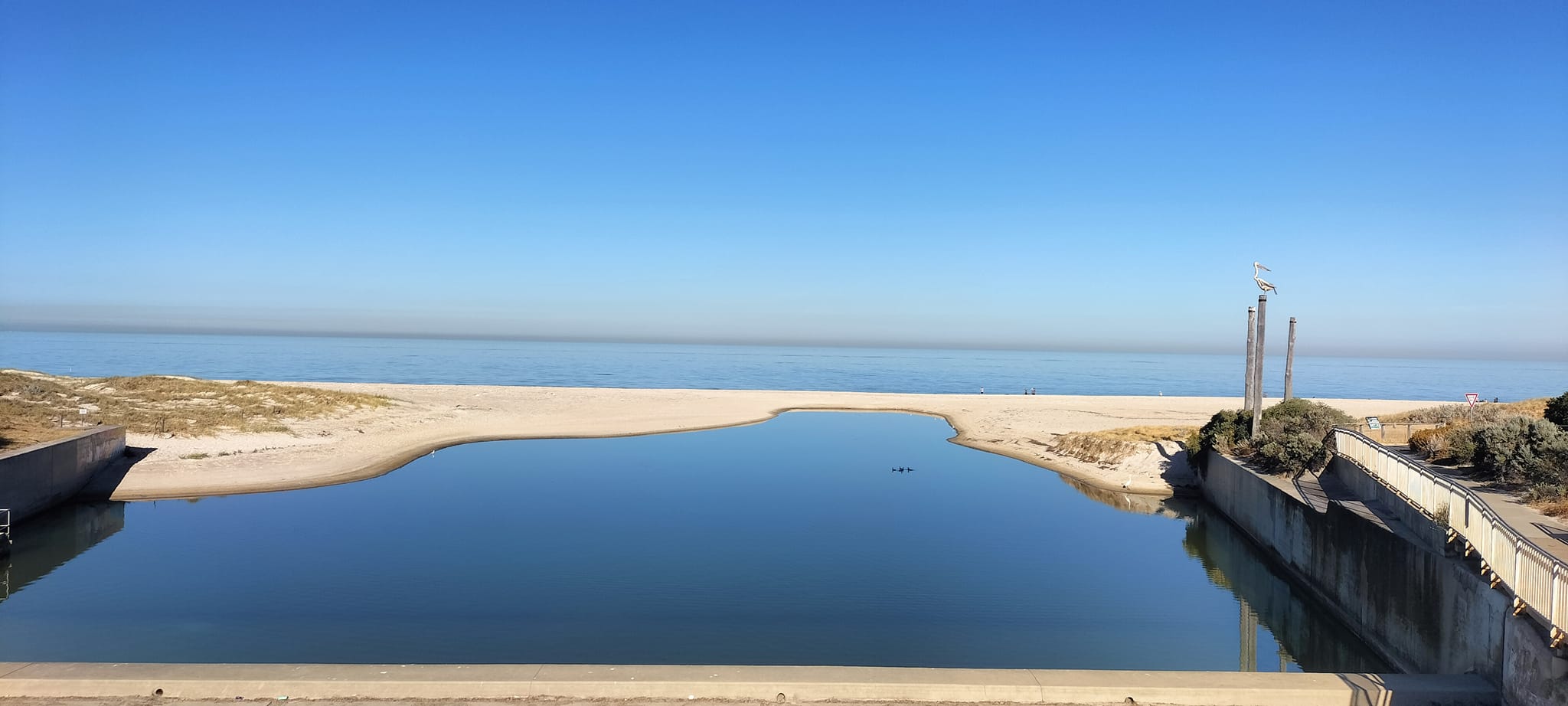 Torrens outlet to be excavated before wet, blustery weekend weather ...