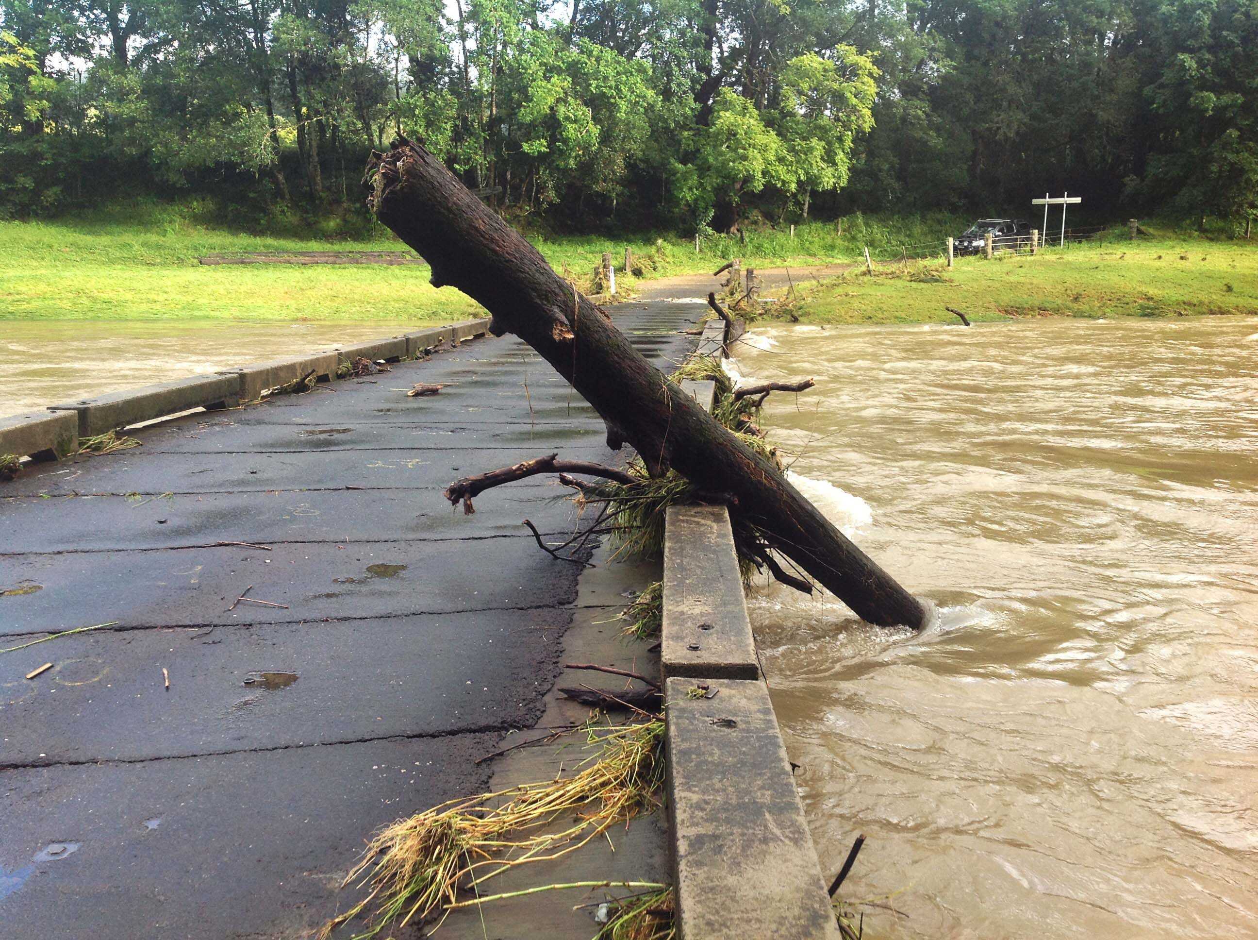 NSW floods: Communities still cut off, 11 rescued, as weather eases ...
