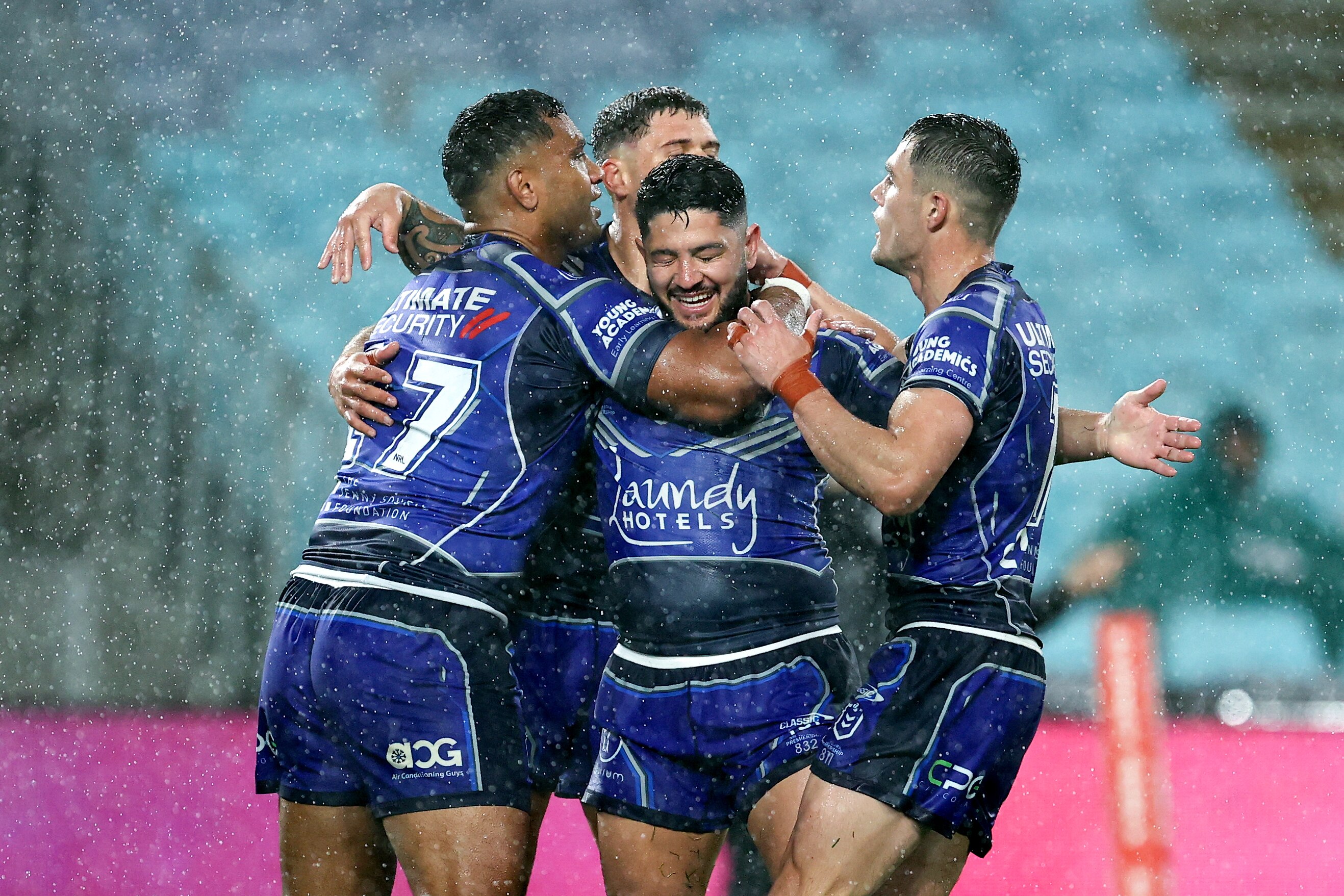 Roosters down Rabbitohs at new SFS, Bulldogs sneak home against Manly ...