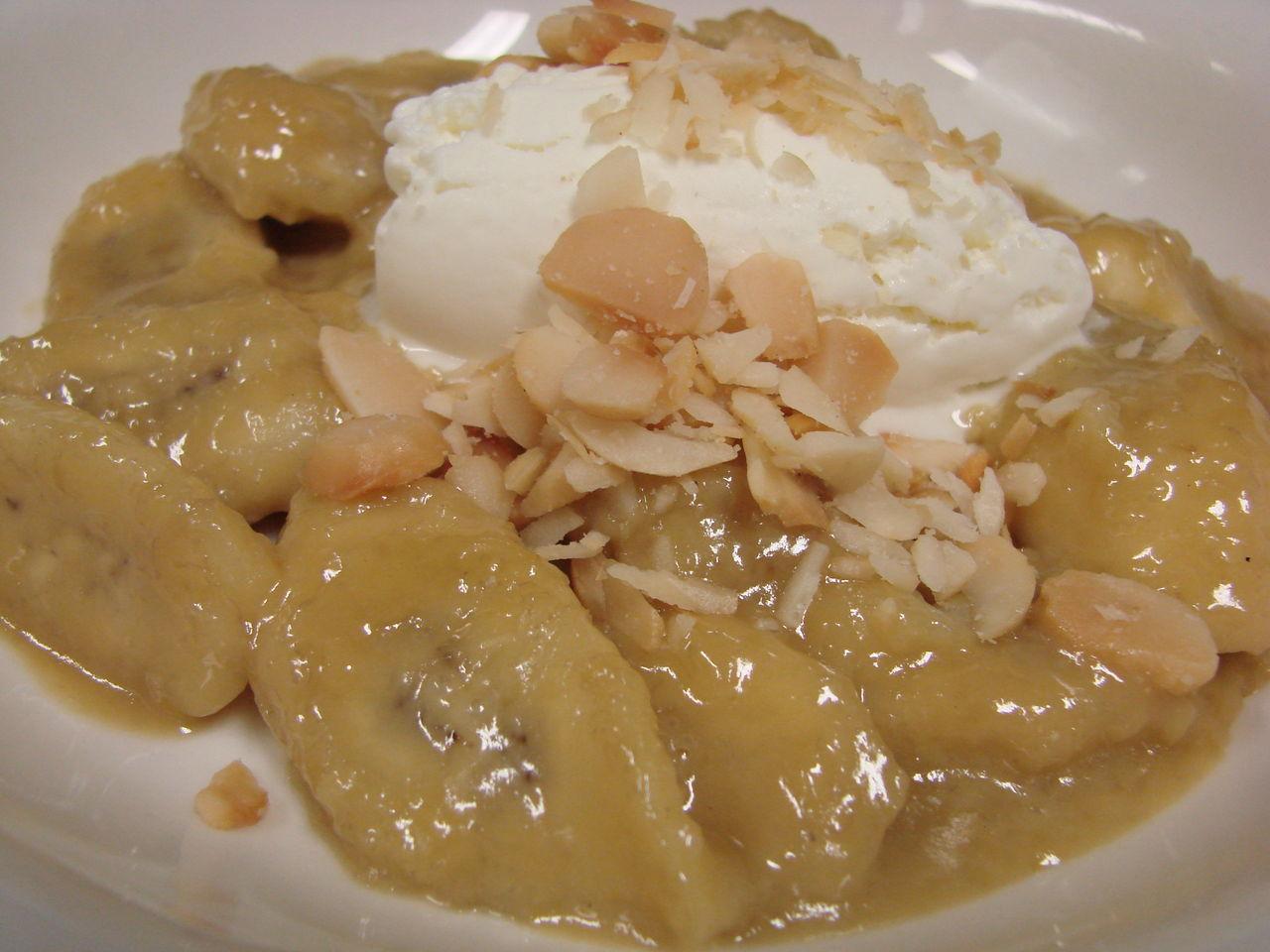 Rum flambed banana with ice cream and toasted macadamia flakes - ABC ...