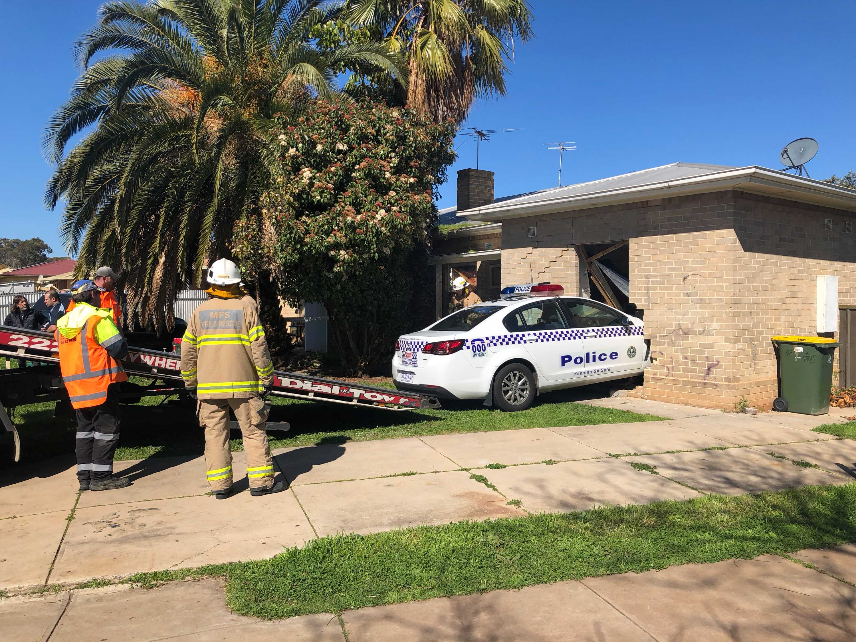 Police car crashes into house in Adelaide's northern suburbs - ABC News
