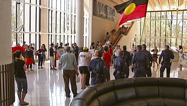Protesters storm High Court over NT intervention ruling - ABC News