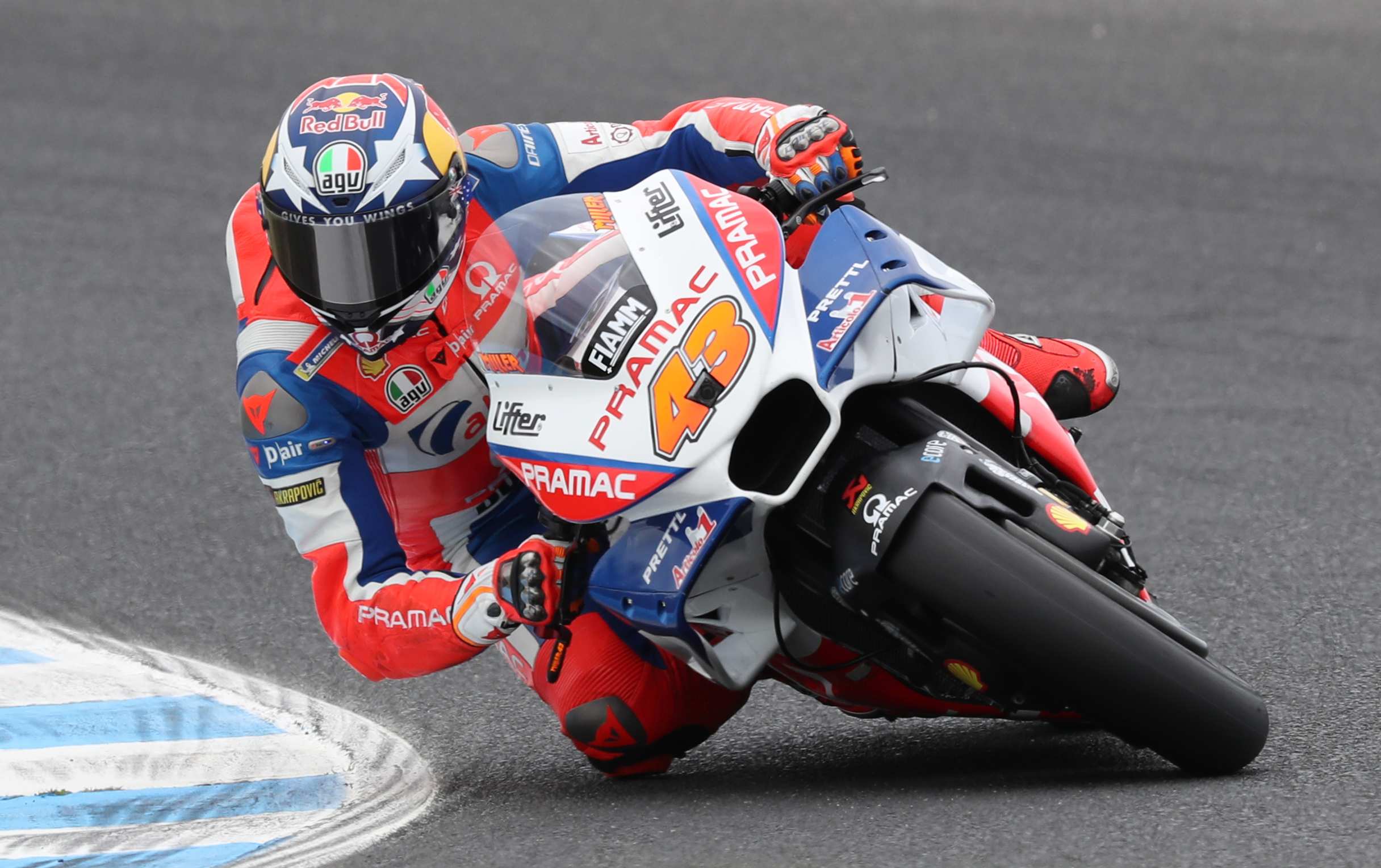 Australian MotoGP rider Jack Miller rips off motorcycle seat during ...