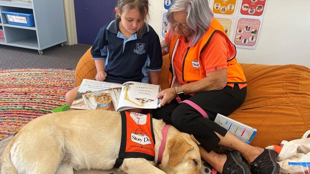 Story Dogs reading program provides positive, calm…